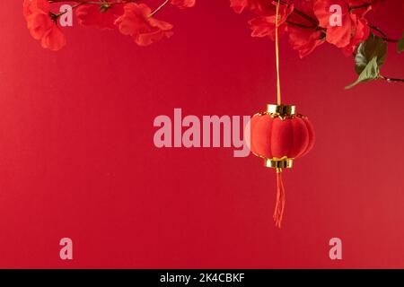 Composition of red chinese decoration on white background Stock Photo ...