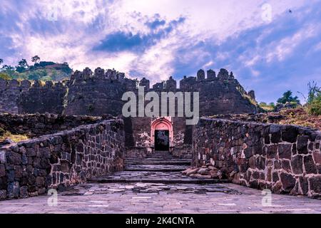 A gorgeous view of Daulatabad Fort in the Devagiri village in Maharashtra, India during sunrise ...