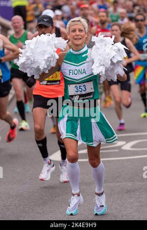 Fiona Carter running in the TCS London Marathon 2022, on Tower Bridge ...