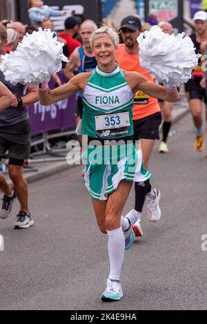 Fiona Carter running in the TCS London Marathon 2022, on Tower Bridge ...