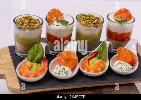 decorated set of Finger food, canapes with seafood Stock Photo - Alamy