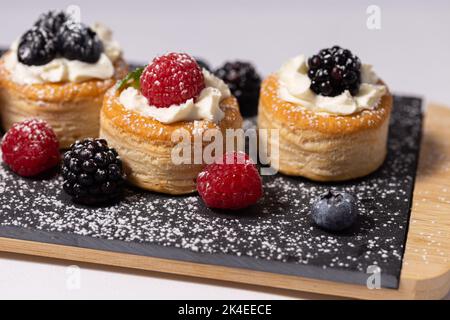 vol au vent with Mixed berry on a slate Stock Photo - Alamy
