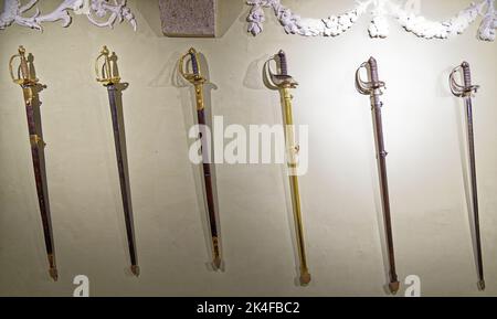 Room with old weapons, ancient armory storage, Europe. Medieval ...