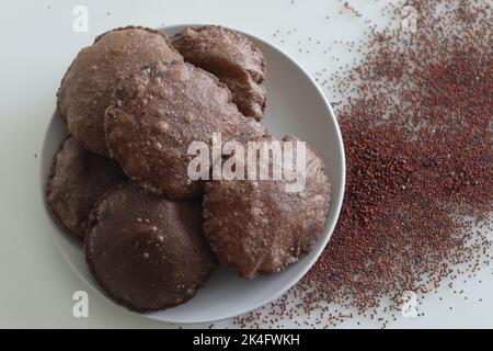 Ragi Poori. Deep fried Indian flat bread made of finger millet and ...
