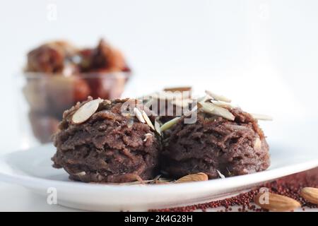 Ragi dates Sheera. Indian pudding made of finger millet flour ghee ...