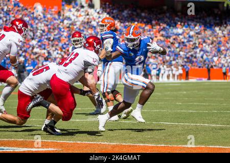 Florida running back Montrell Johnson Jr. performs a drill during the ...