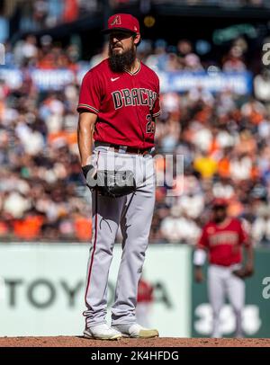 Arizona Diamondbacks relief pitcher Caleb Smith throws to the plate ...