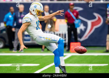 Los Angeles Chargers punter JK Scott (16) kicks during an NFL football ...