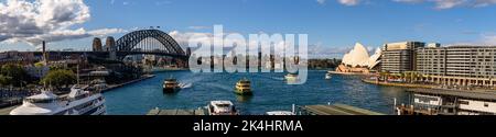 A panoramic view of ferries approaching the Circular Quay Ferry Wharf ...