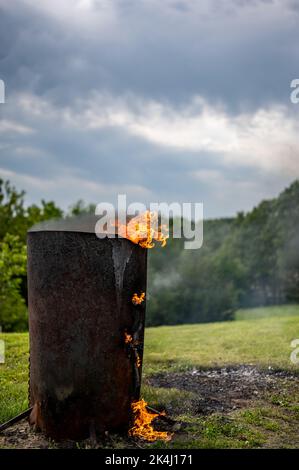 Burn barrel in a rural area used to incinerate trash and garbage Stock ...