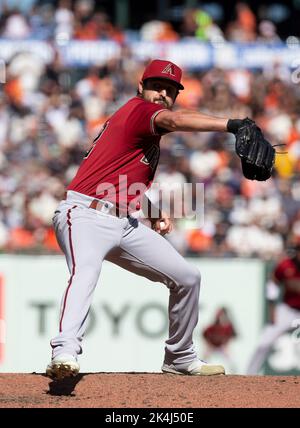 Arizona Diamondbacks relief pitcher Caleb Smith throws to the plate ...