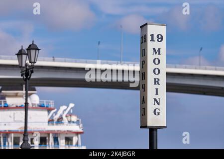 Mooring pier signs in city embankment, identification signs with ...