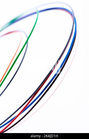 Abstract curves, colorful electrical cable wire isolated on white ...