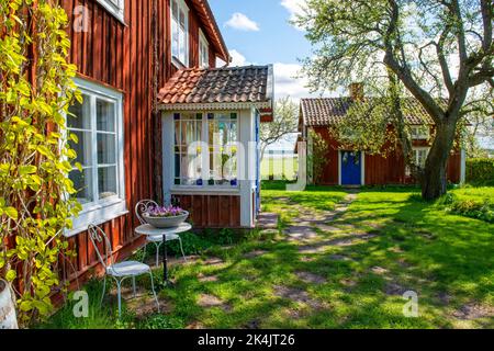 A falu-red dwelling-house with a garden in front, Sörmland, Sweden ...