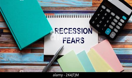 Recession fears symbol. Concept words Recession fears on wooden blocks ...