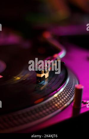 Turntable plays a vinyl record Stock Photo - Alamy