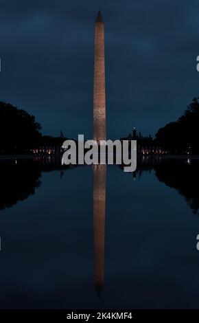 A vertical shot of modern buildings near the mountains in Espera, Spain ...
