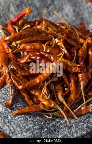 Dry Red Organic Chile De Arbol Peppers in a Bunch Stock Photo - Alamy