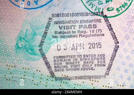 Singapore immigration stamp in passport Stock Photo - Alamy