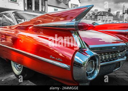The rear wing and lights of a 1959 Cadillac Coupe De Ville in bright ...