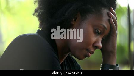Preoccupied black woman feeling stress and pressure. African person ...