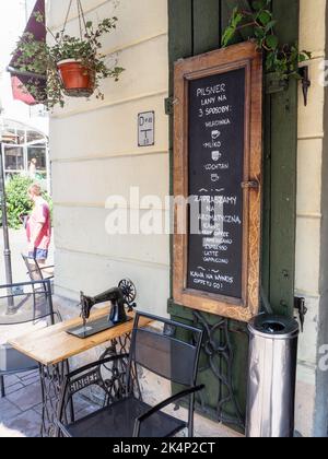 Krakow, Poland - August 4, 2018: Singer klub café with sewing machines ...
