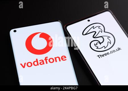 Vodafone and Three potential merger concept. The smartphones seen ...