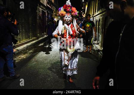 A masked deity performs the Astamatrika Naach, an auspicious dance ...