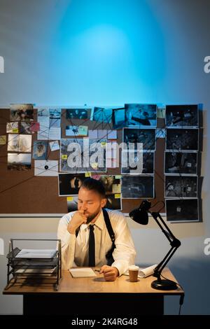 Detective working at desk in her office use cellphone talk on ...