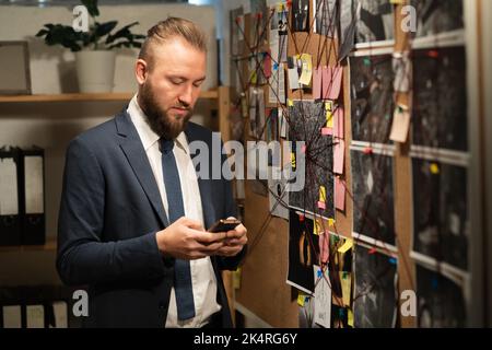 Detective board with fingerprints, photos, map and clues connected by ...