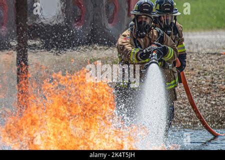 Staff Sgt. Ryan Guenther and Senior Airman Alex Walker, 445th Civil ...