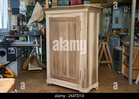 Newly Made Walnut Baroque Cabinet Stands In Carpenter's Workshop Of An ...