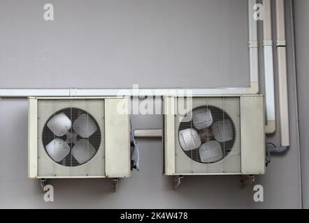 The air conditioner condensing unit (CDU) with twin fans Stock Photo ...