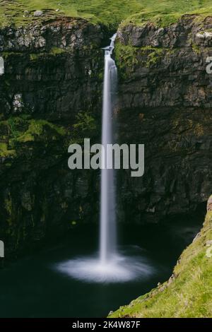 the Mulafossur Waterfall in the village of Gasaladur on the island of ...