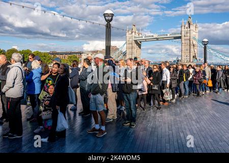 Stretching Back To Tower Bridge, British People and People From Around ...