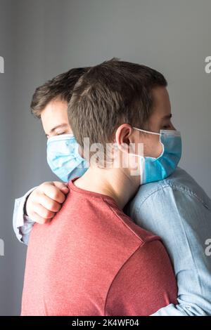 Two disposable surgical face masks with rubber pads to cover the mouth ...