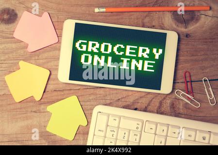 Hand writing sign Grocery Online. Business showcase digital version of ...