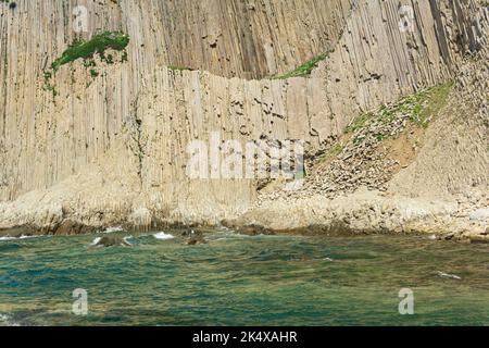 natural landscape with a sheer cliff folded columnar basalt on the ...