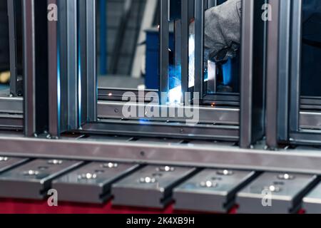 welding of metal structures on the welding table Stock Photo - Alamy