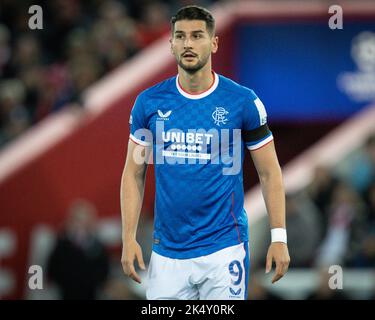 Rangers' Antonio-Mirko Colak and James Tavernier (left) show referee ...