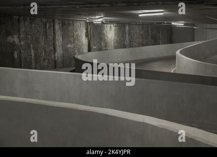Perspective view of Curving shaped ramp of the basement made of ...