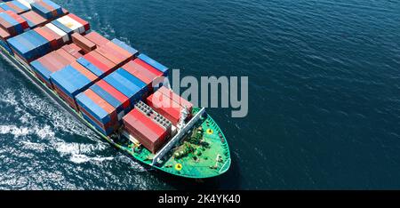 Aerial front of cargo ship carrying container and running near ...