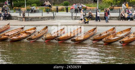 Handcrafted cedar strip canoe's on shore during the summer season Stock ...
