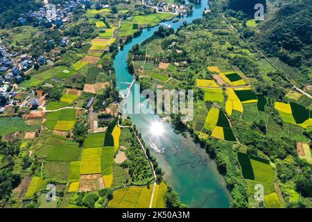 GUILIN, CHINA - OCTOBER 4, 2022 - An aerial photo shows rice ripens ...