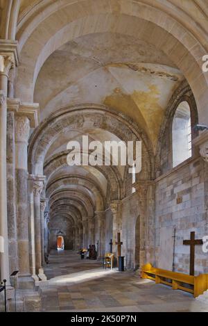 Side aisle with arches of the medieval basilica Sainte-Marie-Madeleine ...
