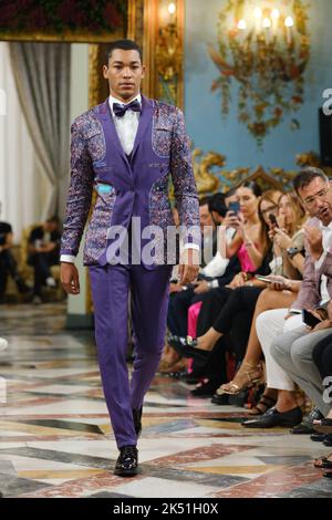 A model showcases a creation by Jose Acosta during the Atelier Couture ...