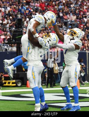 Los Angeles Chargers guard Zion Johnson (77) takes his stance during an ...