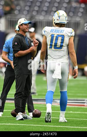 Los Angeles Chargers head coach Jim Harbaugh watches from the sideline ...