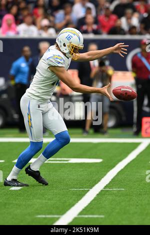 Los Angeles Chargers punter JK Scott (16) kicks during an NFL football ...