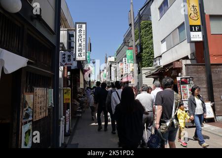 Many tourists visit the famous Komachi Street in historic Kamakura city ...